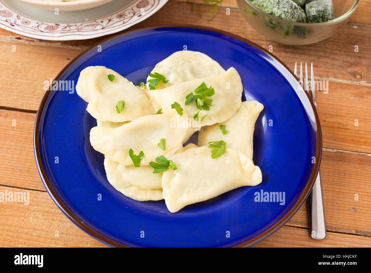 Pierogi, polish boiled dumplings Stock Photo - Alamy