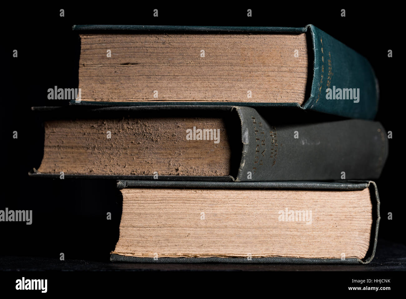 Stack of three books Stock Photo - Alamy