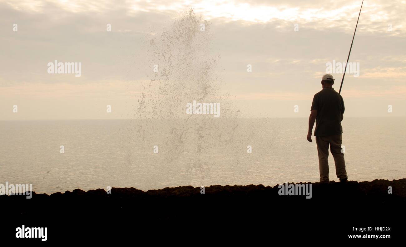 Old man fishing Stock Photo - Alamy