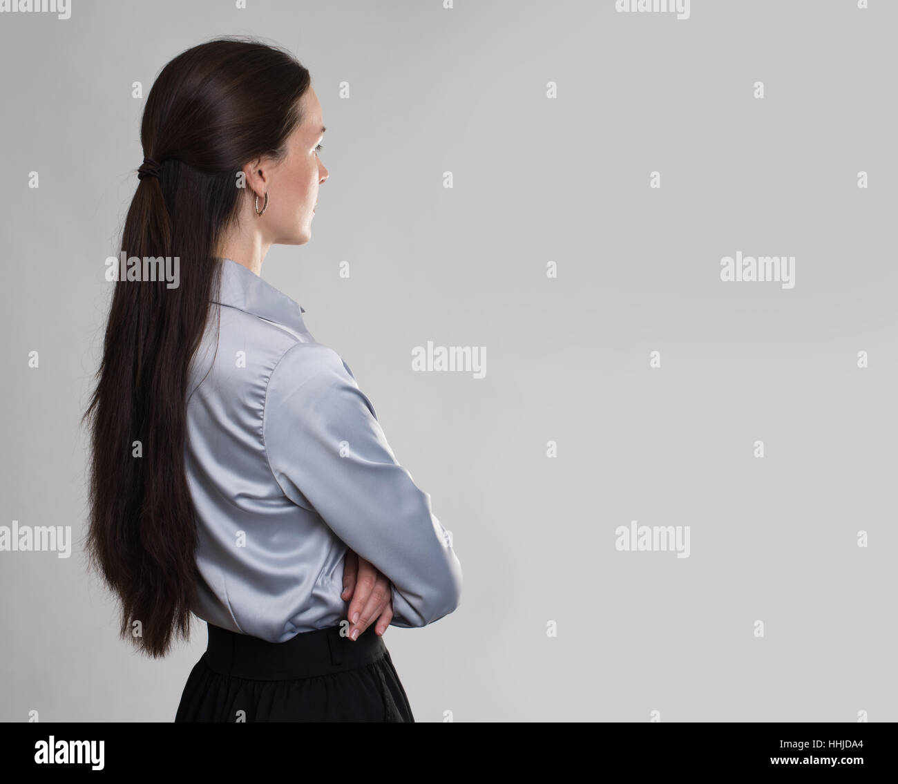 beautiful woman looking at copy space. Back view Stock Photo - Alamy