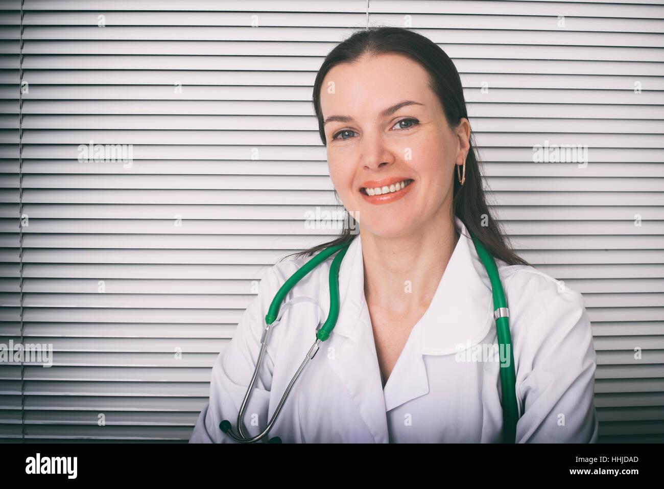 Caring female doctor hi-res stock photography and images - Alamy