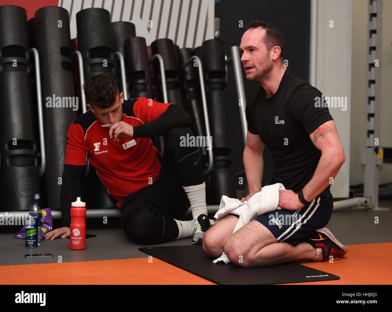 Ed Corrie, from the Bums Out Guns Out campaign group, is watched by his ...