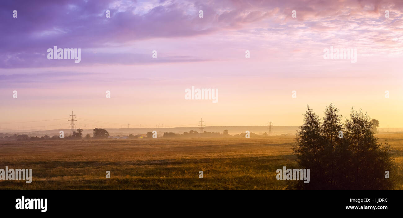 Misty dawn on early summer morning in village. Fresh morning air and ...