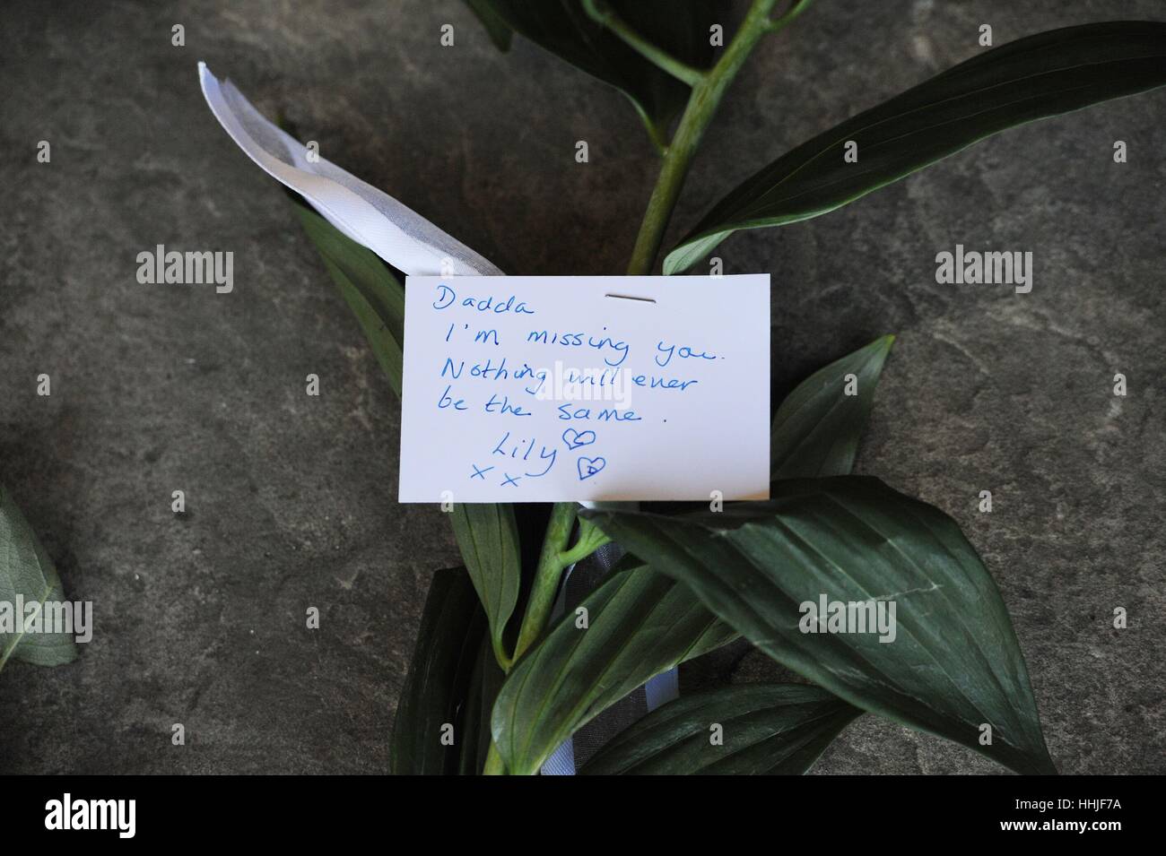 A floral tribute left by daughter Lily for Status Quo guitarist Rick ...