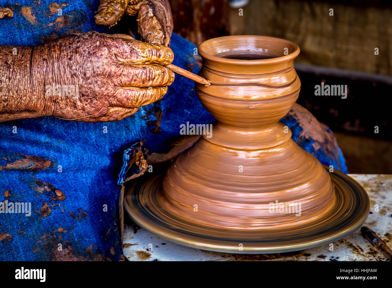A potter making clay bowls in Old Town San Diego, California Stock ...