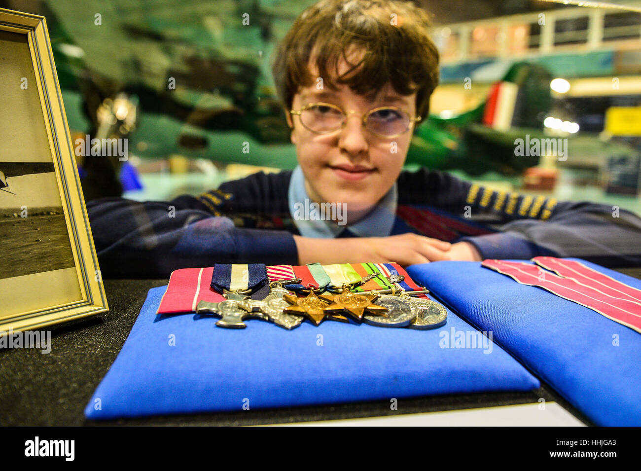 Eachan Hardie, 12, looks at medals belonging to Captain Eric ÒWinkleÓ ...