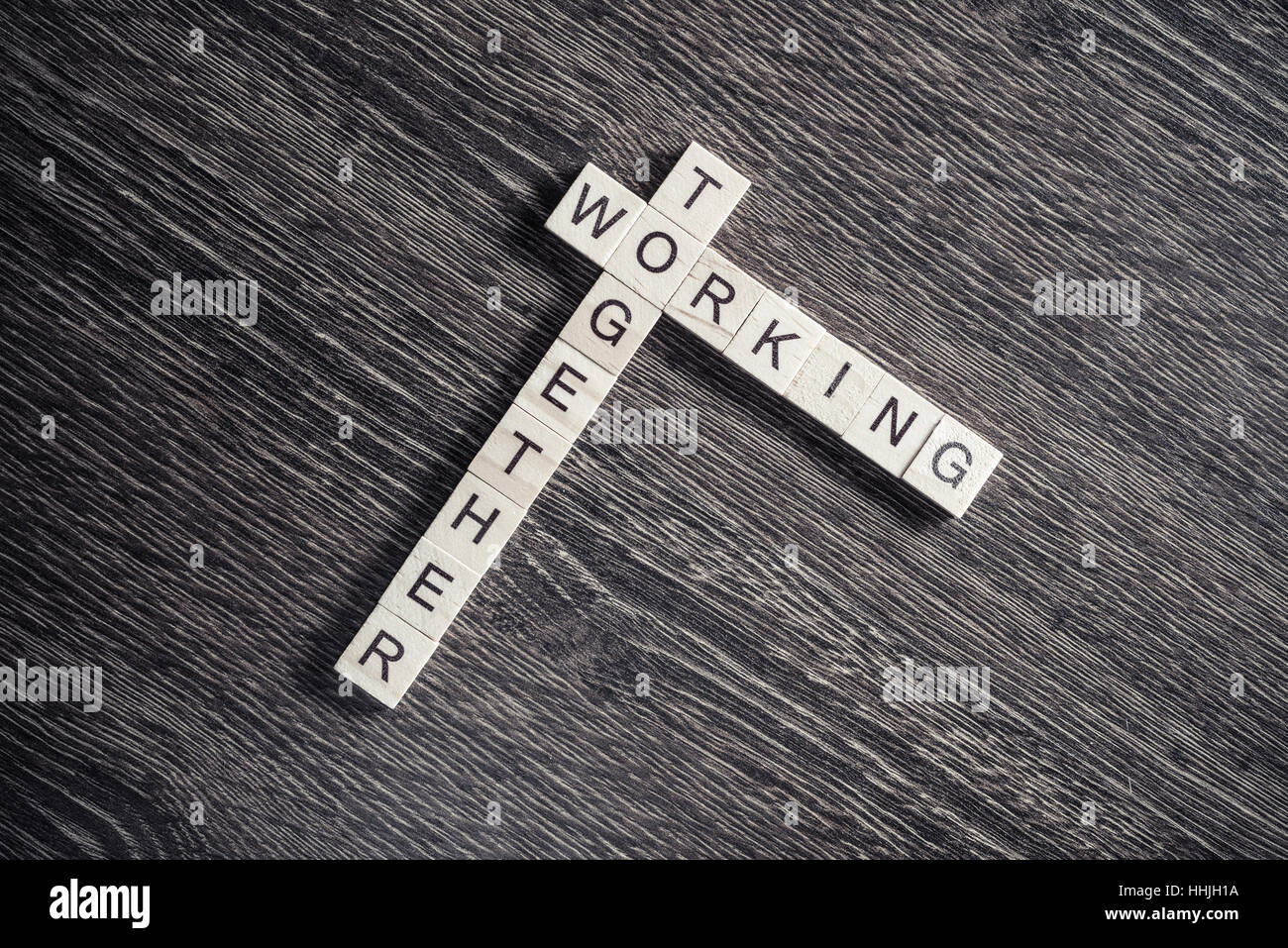 Conceptual business keywords on table with elements of game making ...