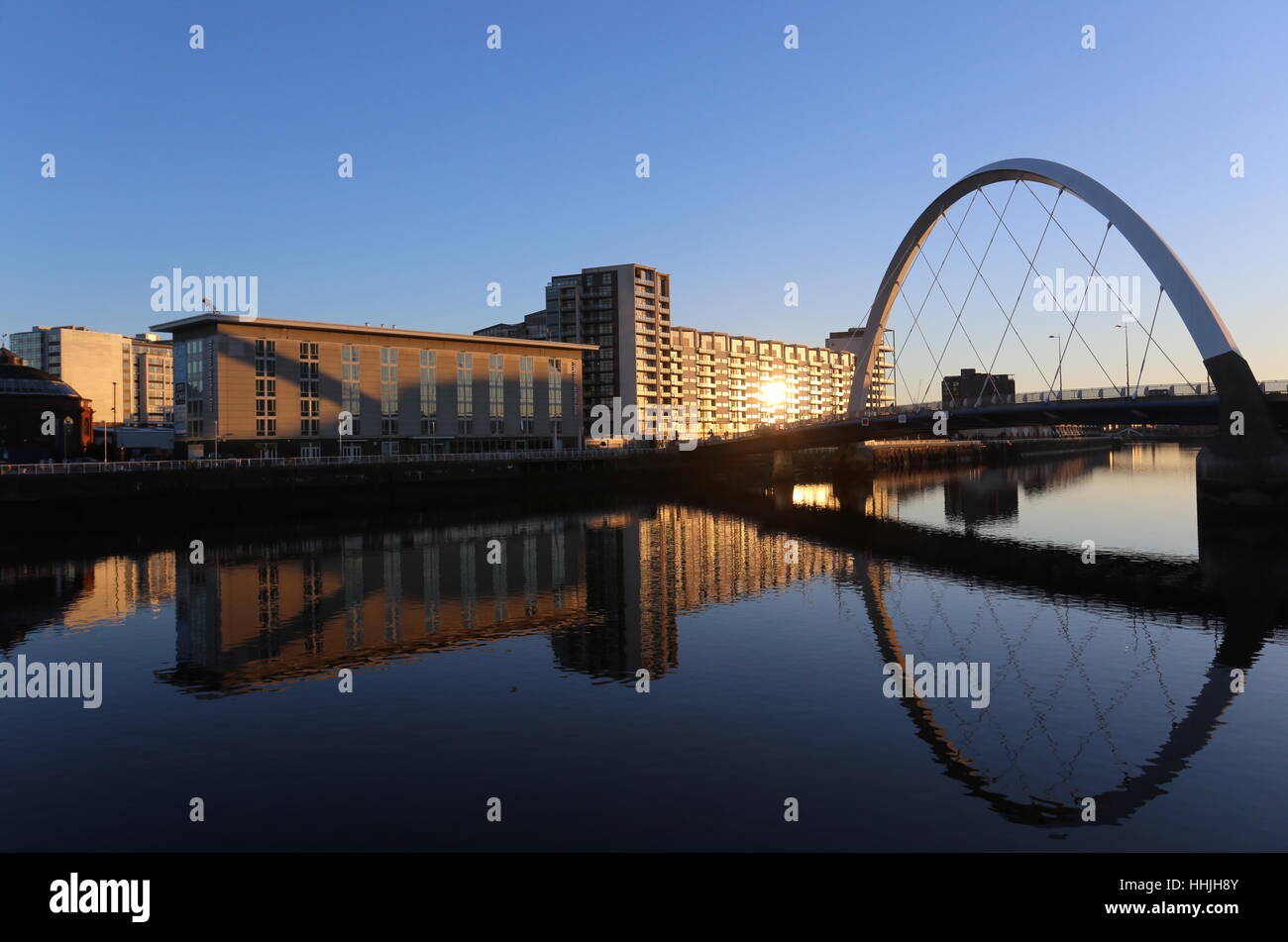 Clyde Arc bridge reflected in River Clyde Glasgow Scotland January 2017 ...