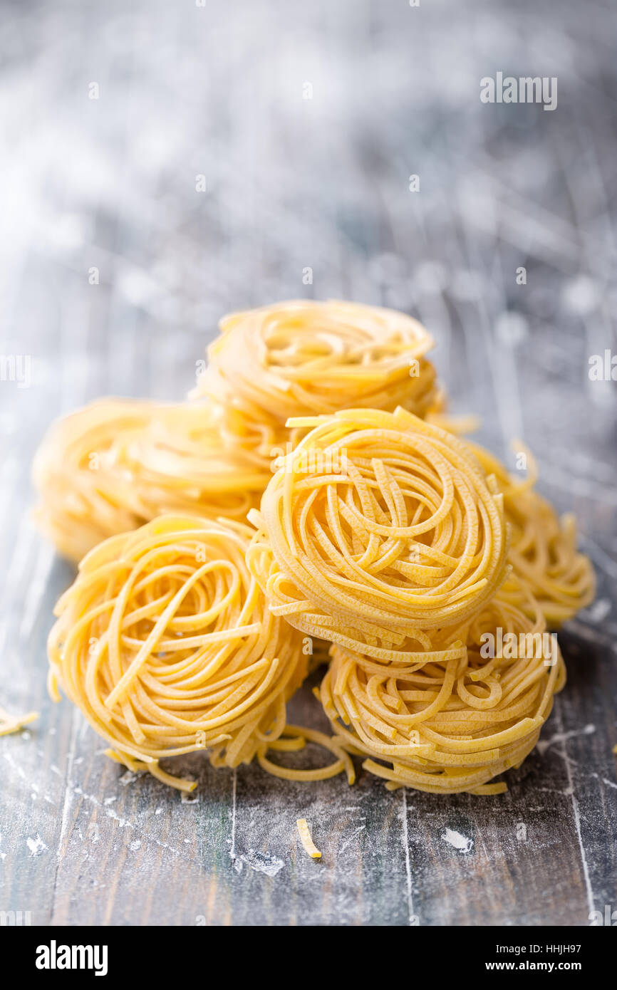 Tagliolini pasta raw uncooked hi-res stock photography and images - Alamy