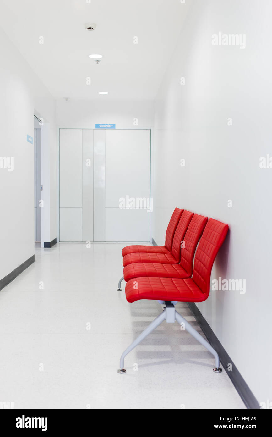 Red Bench, Red chair in Waiting room Stock Photo - Alamy