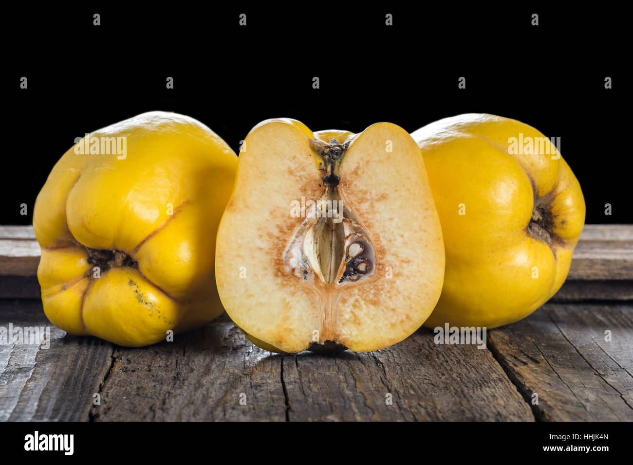 Sliced quince on wooden hi-res stock photography and images - Alamy