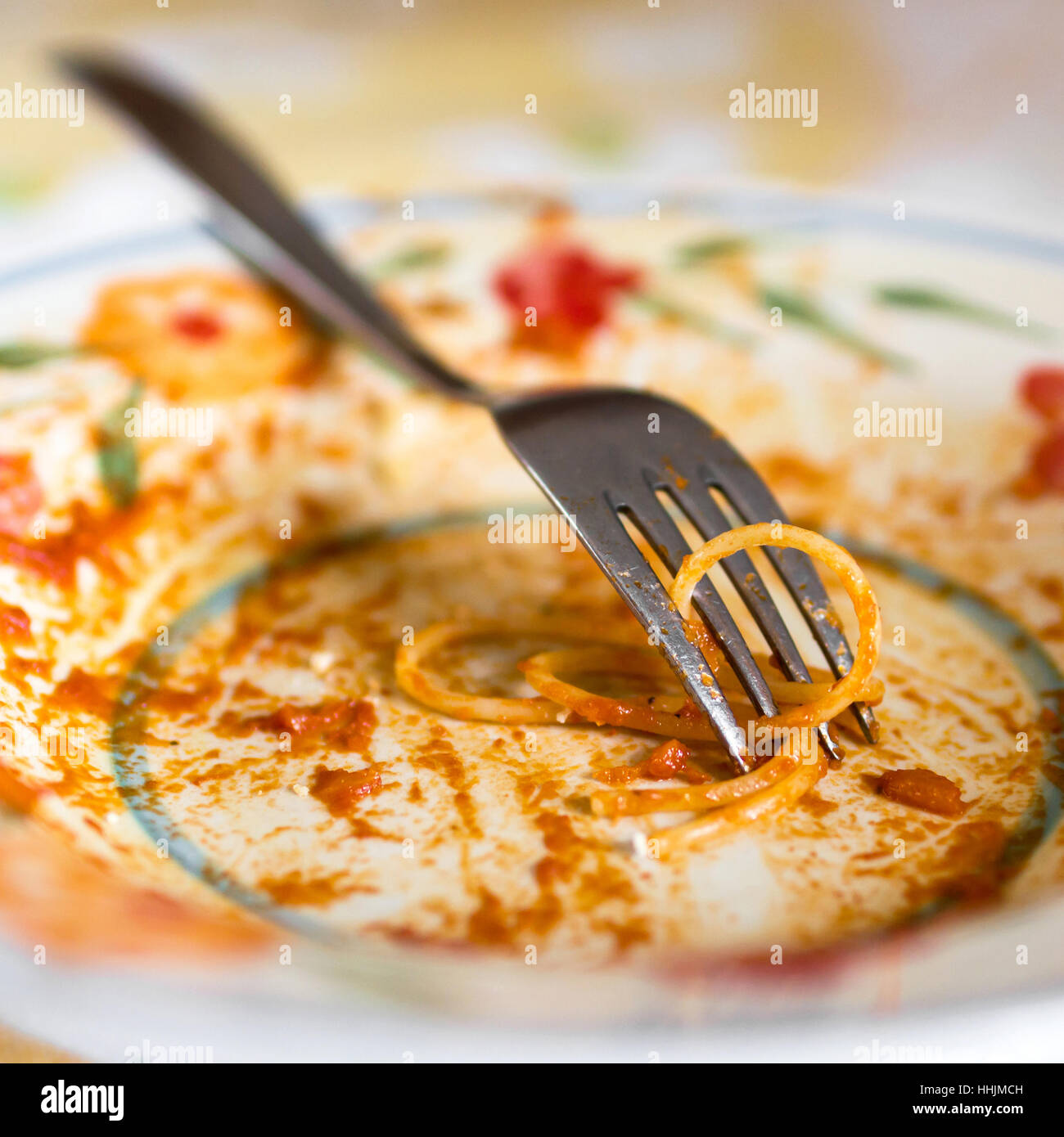 Traditional dirty plate after spaghetti pasta with meat and tomato ...