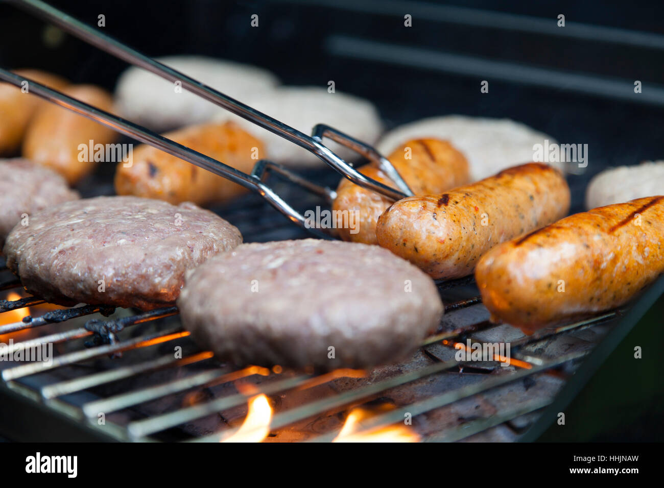 Turning burger hi-res stock photography and images - Alamy