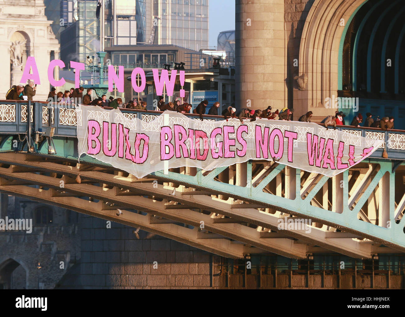EDITORIAL USE ONLY A banner is unfurled on London's Tower Bridge ...