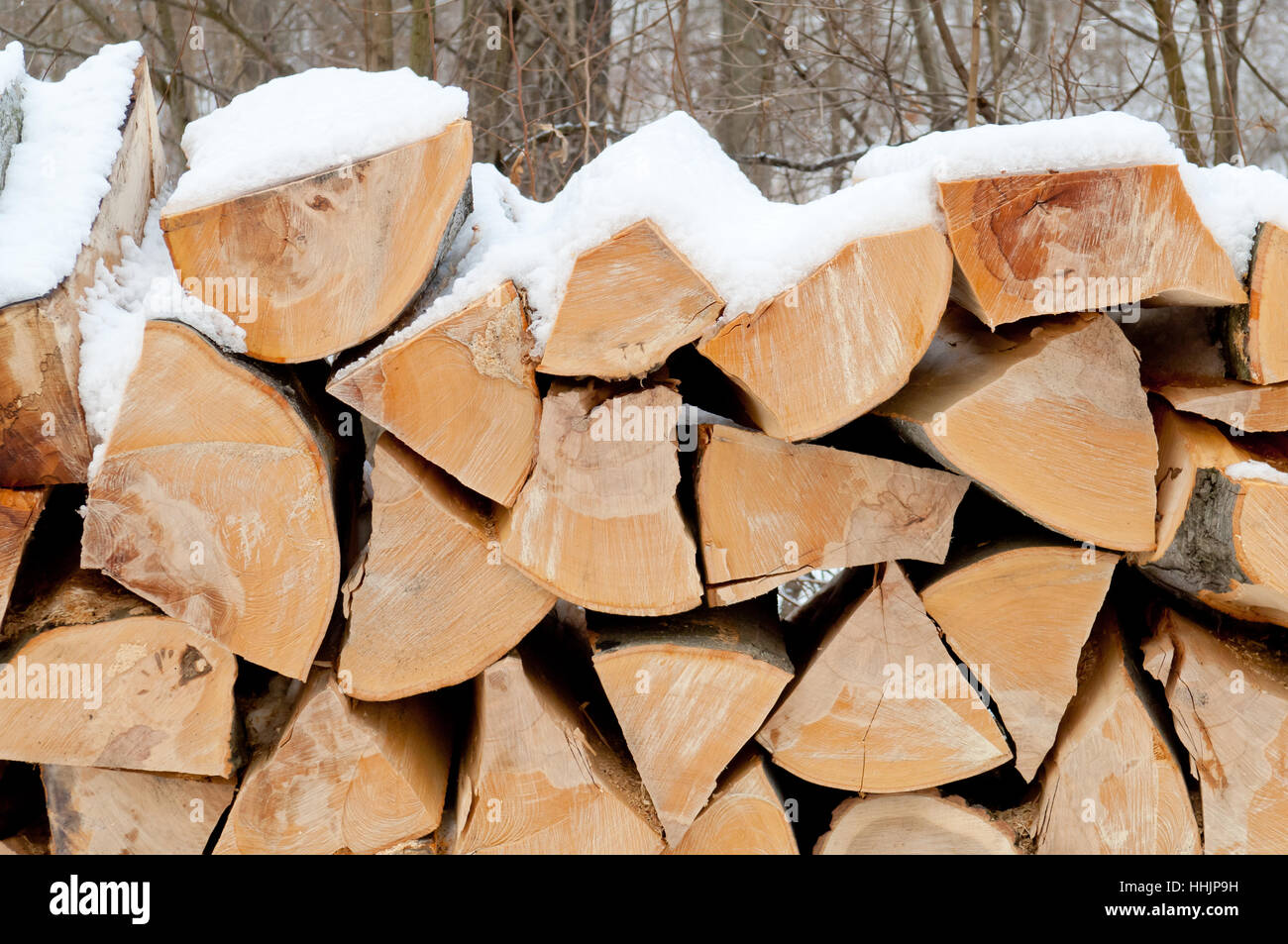 Natural wooden background, chopped firewood on stack Stock Photo - Alamy