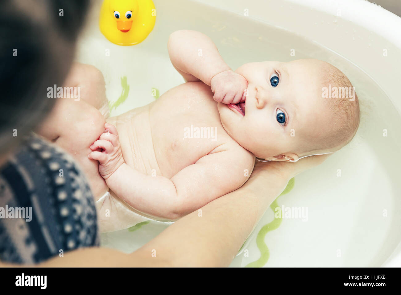 Infant bathing hi-res stock photography and images - Alamy