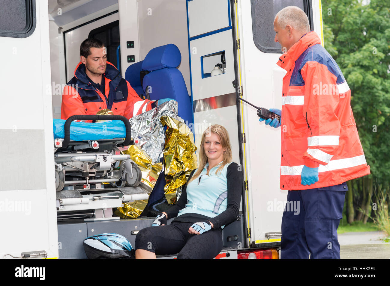 Medical team helping patient sit hi-res stock photography and images ...