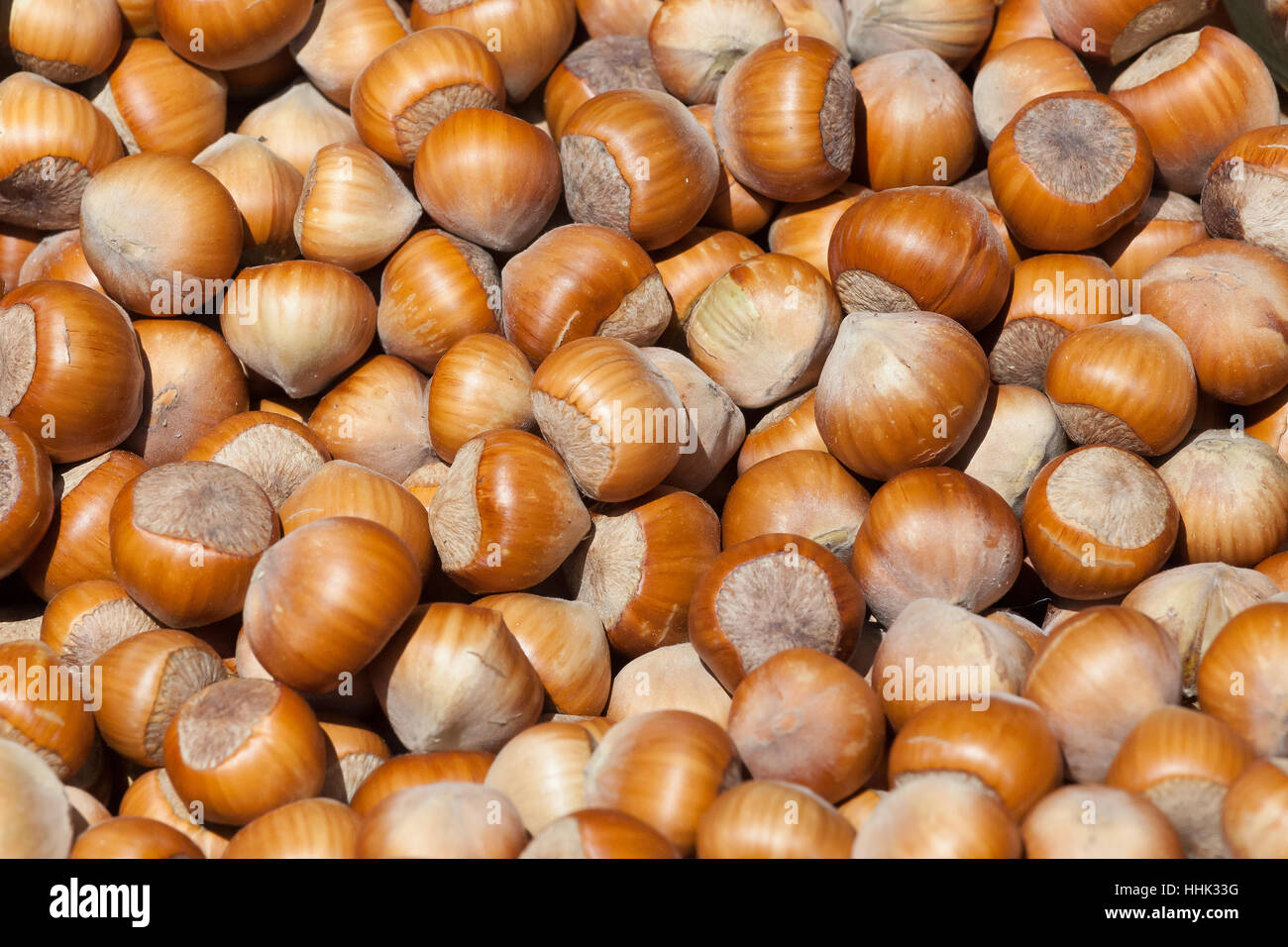 the background consisting of a set of small beautiful nuts Stock Photo ...