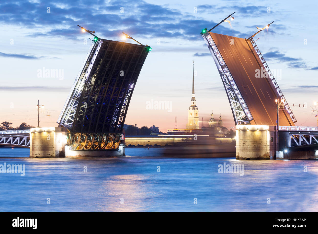 The raised Palace bridge at white nights in the city of St.-Petersburg ...