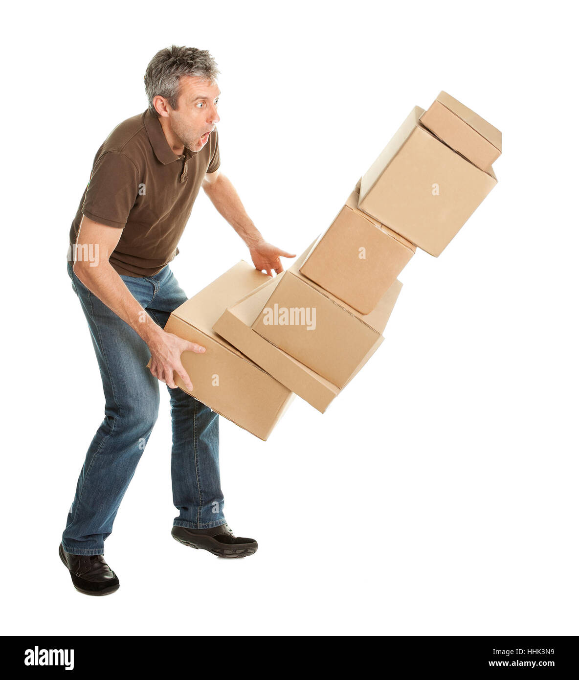 Delivery man with falling stack of boxes. Isolated on white Stock Photo ...