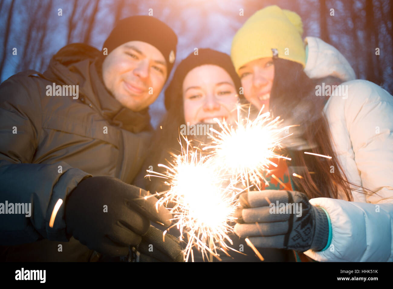 Beautiful Friends with bengal lights Stock Photo - Alamy