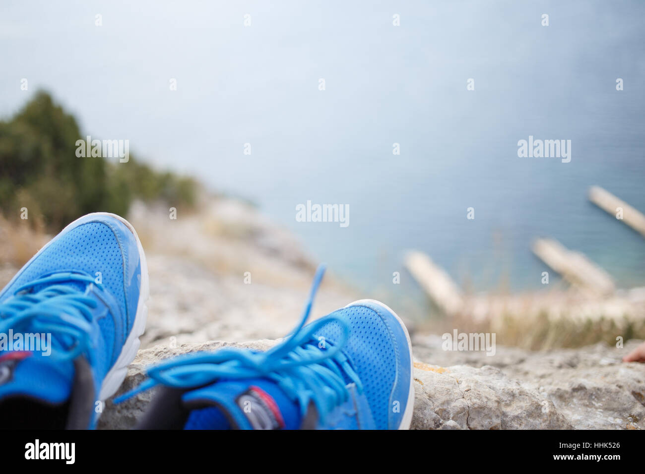 Shoes on background of mountain Stock Photo - Alamy