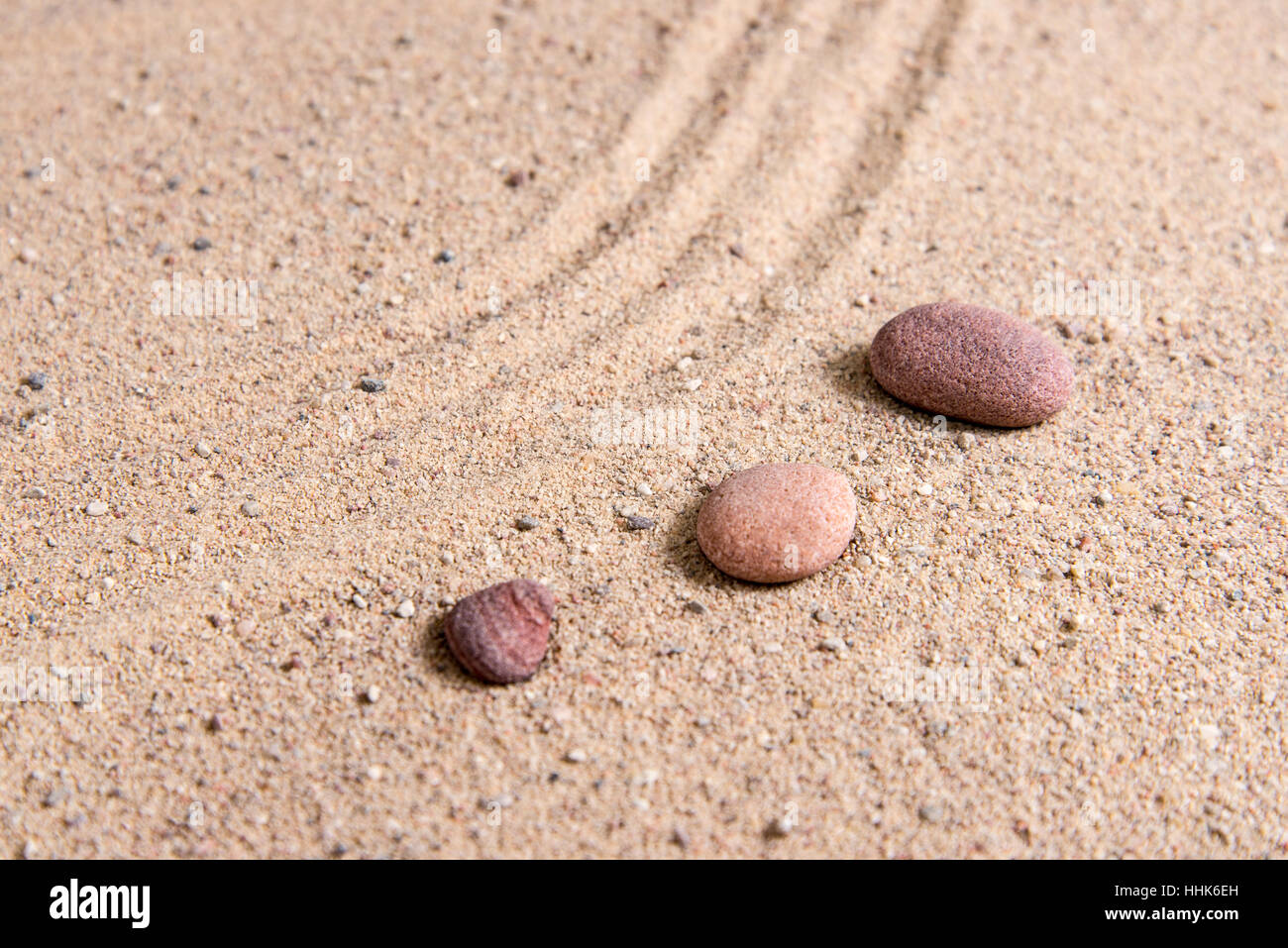 zen garden sand waves and rock sculptures Stock Photo - Alamy