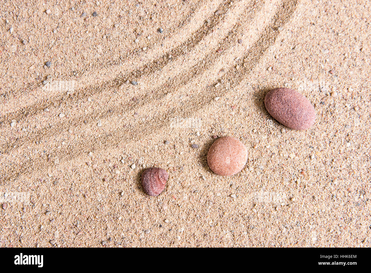 zen garden sand waves and rock sculptures Stock Photo - Alamy