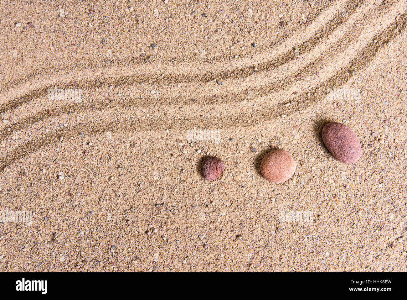 zen garden sand waves and rock sculptures Stock Photo - Alamy