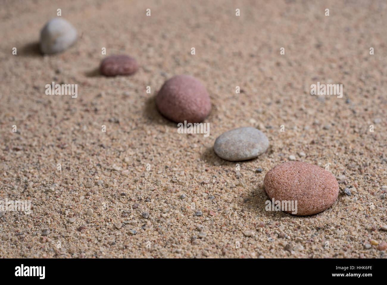 zen garden sand waves and rock sculptures Stock Photo - Alamy