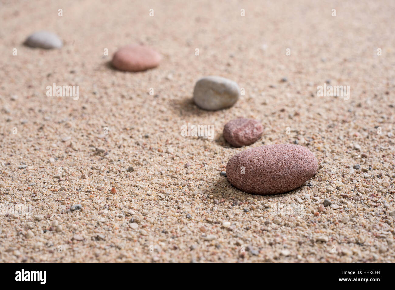 zen garden sand waves and rock sculptures Stock Photo - Alamy