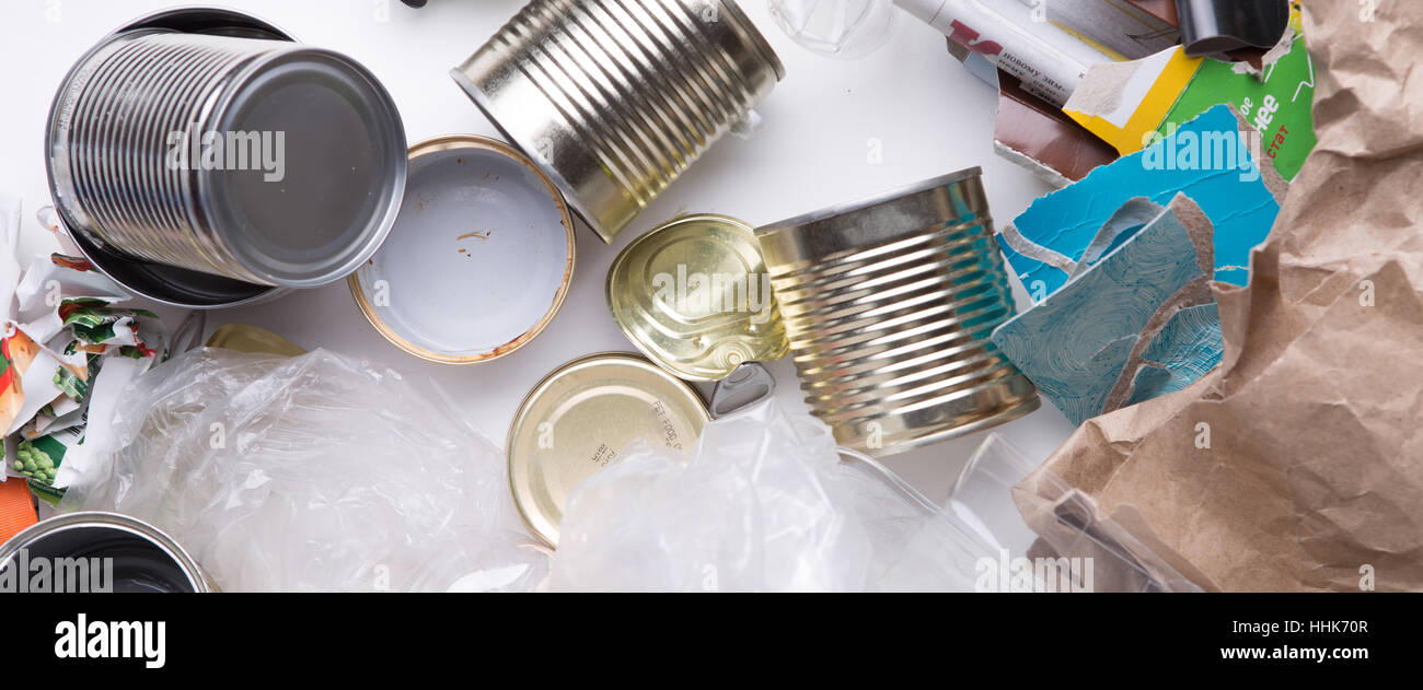 Picture of various garbage recycle on white table Stock Photo - Alamy