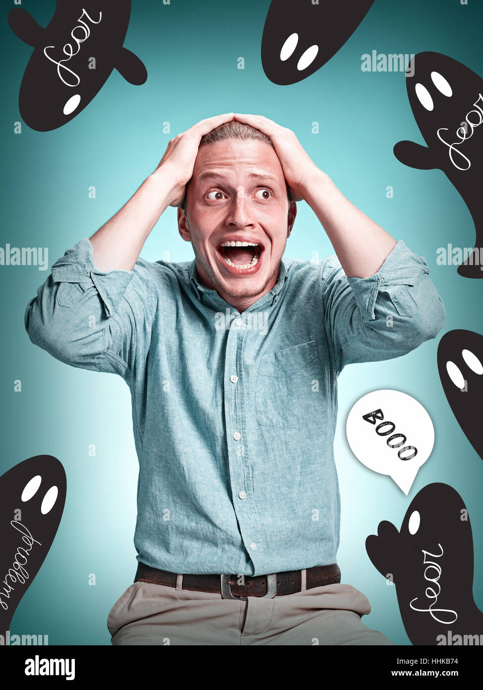 The disappointed young man over blue background Stock Photo - Alamy