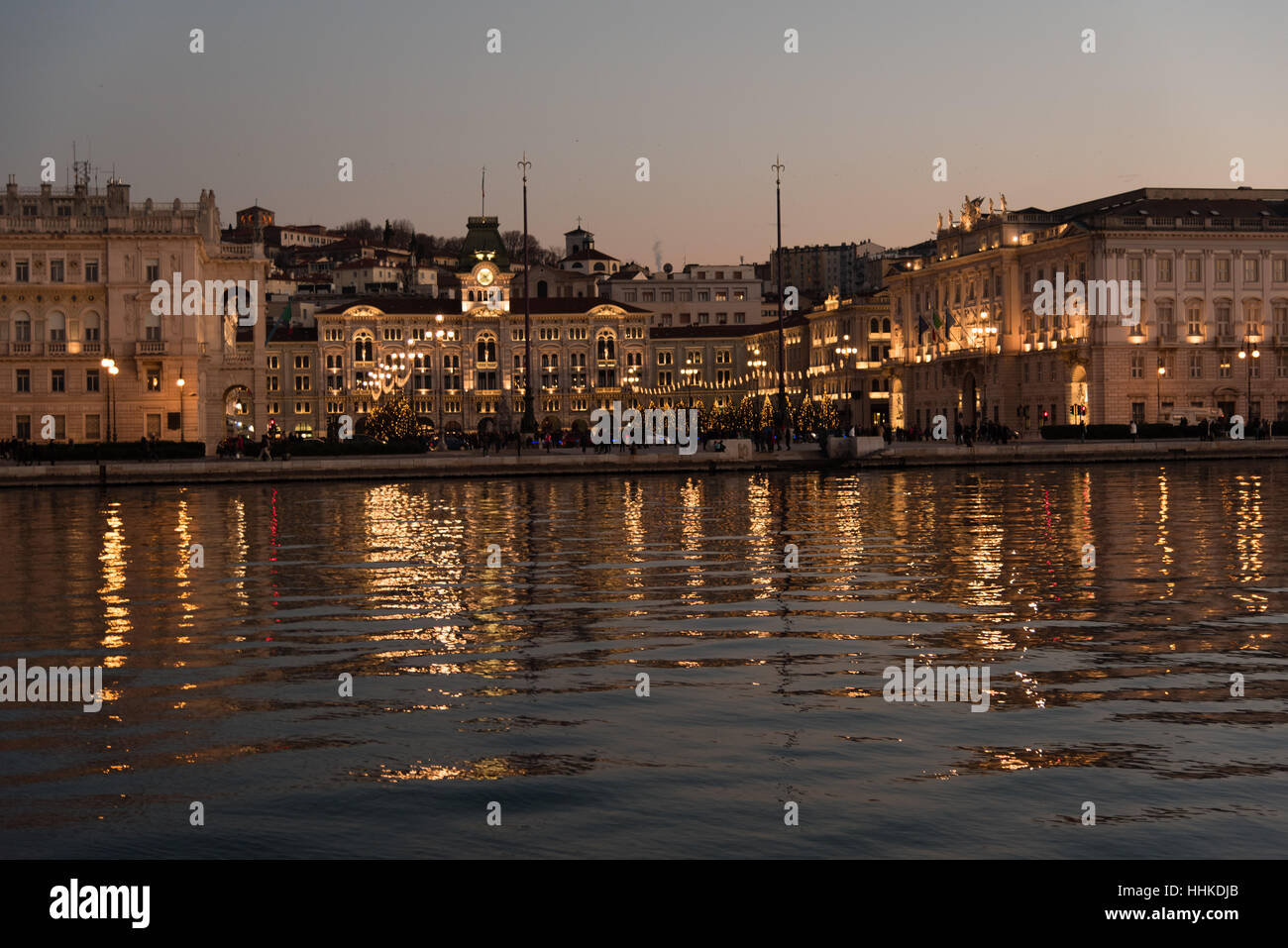 Reflections on the sea of Trieste at dusk - Historical buildings and ...