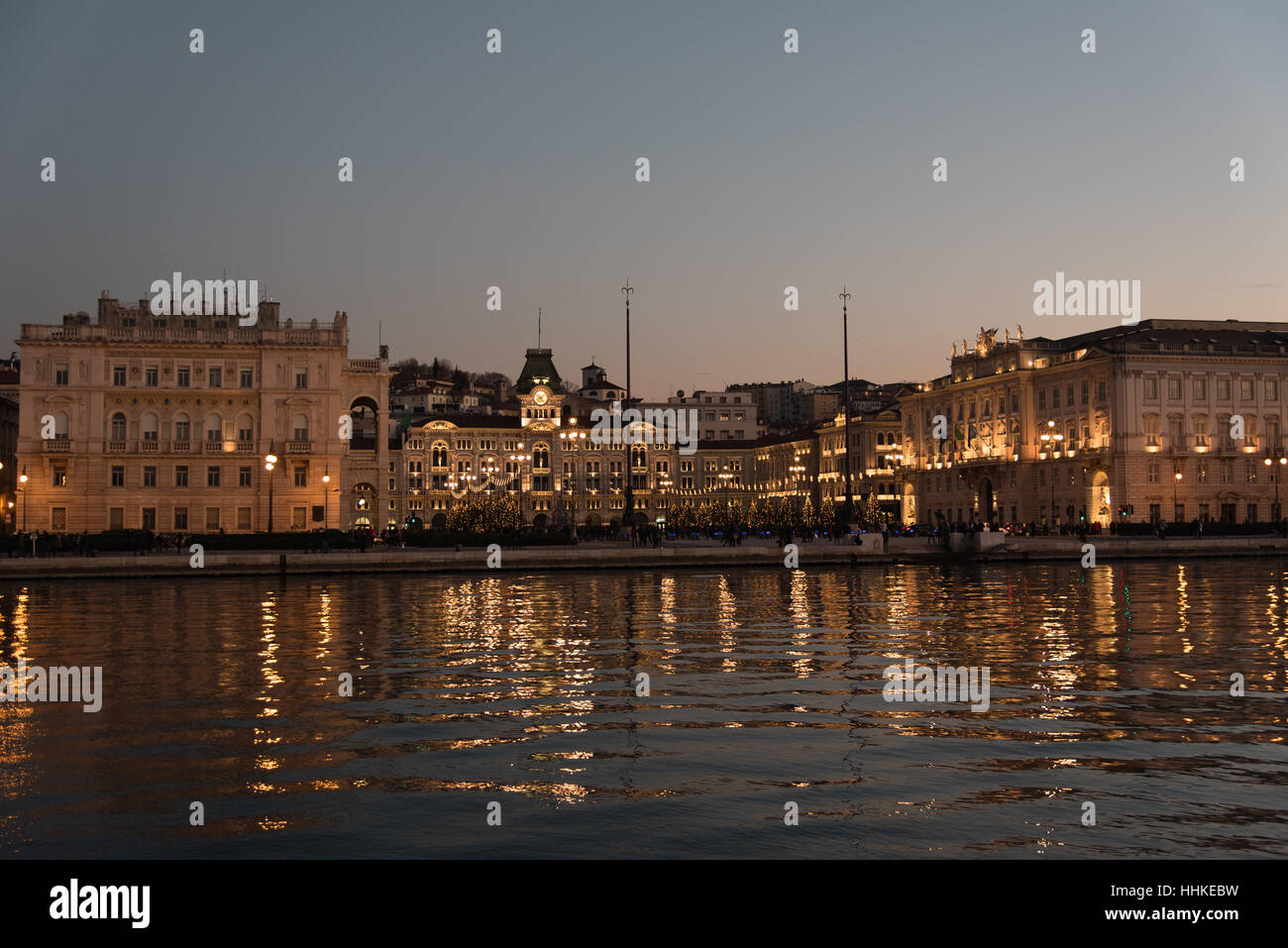 Reflections on the sea of Trieste at dusk - Historical buildings and ...