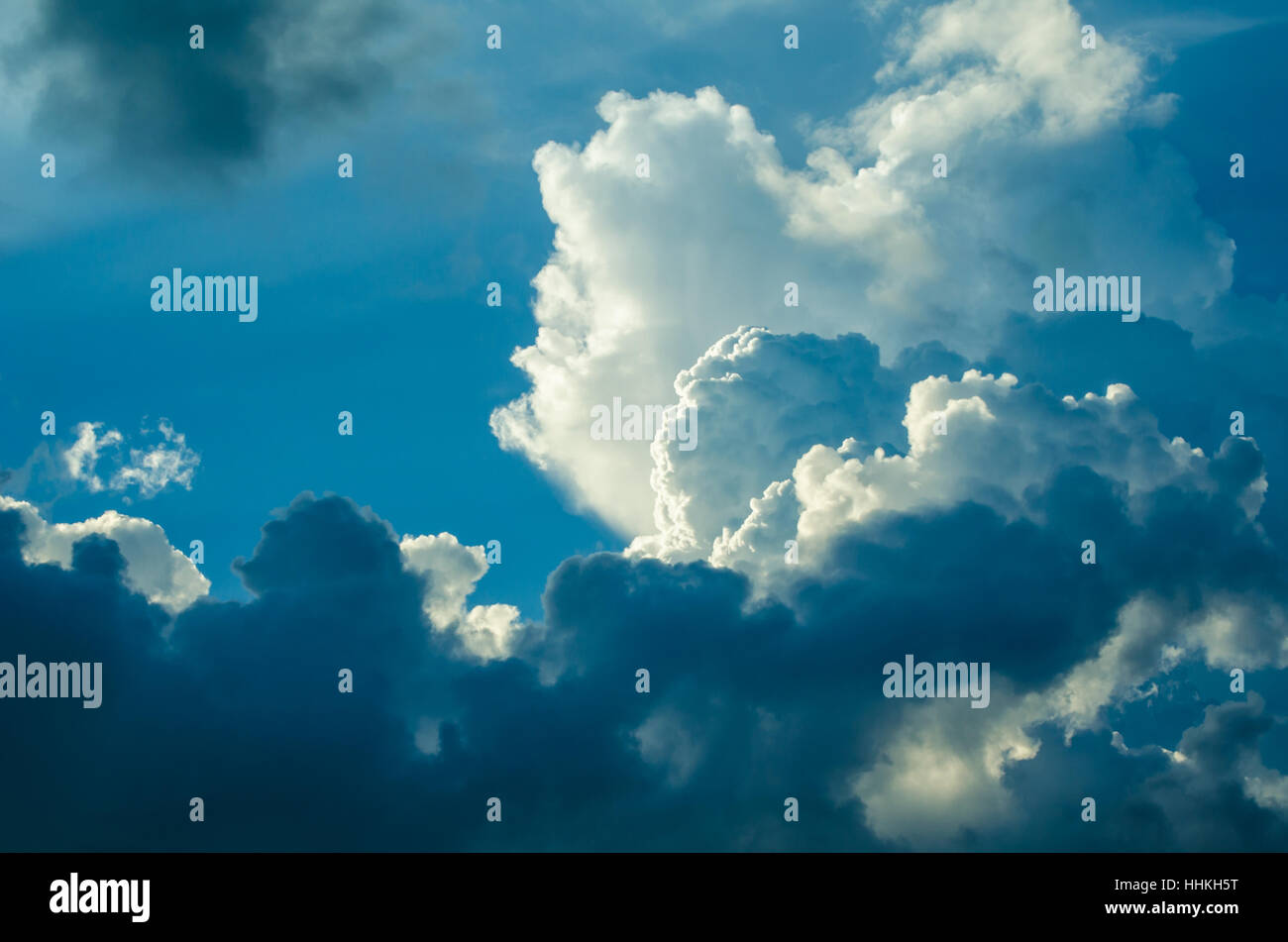 spectacular clouds at sunset from white to dark blue Stock Photo - Alamy