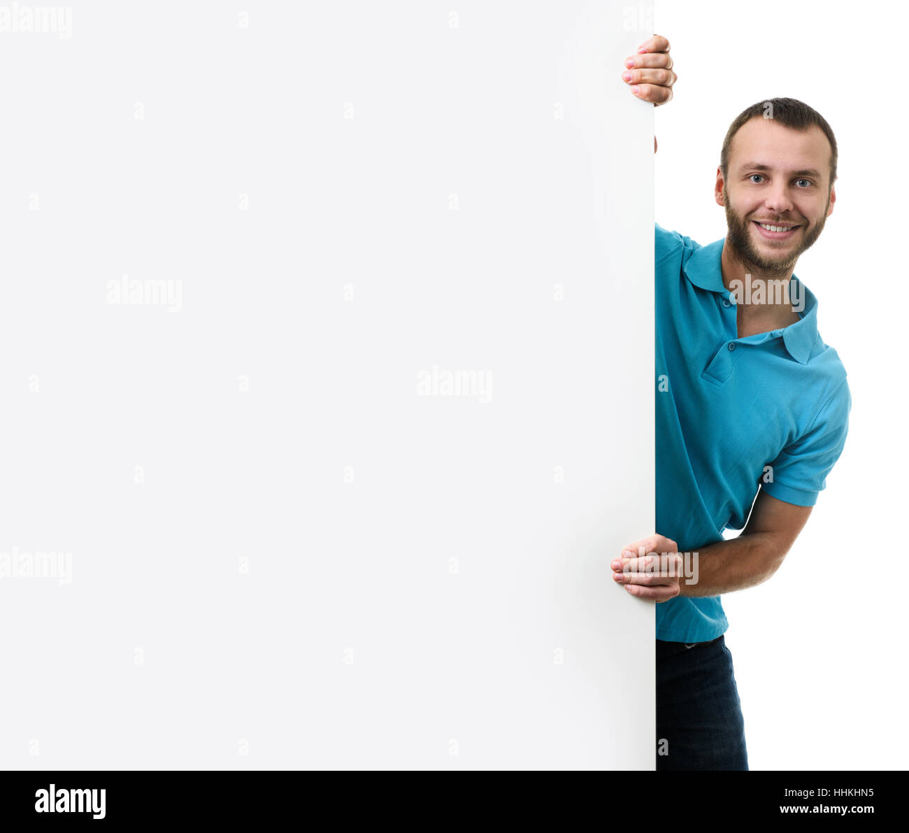 Happy casual bearded man with a banner isolated over white background ...