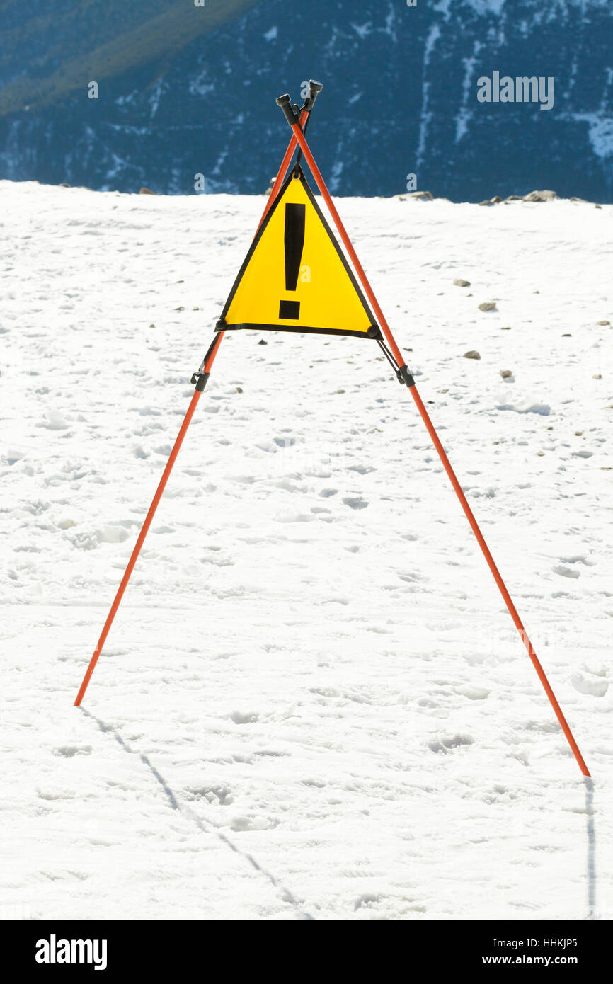 Caution sign at a slope of a ski resort Stock Photo - Alamy