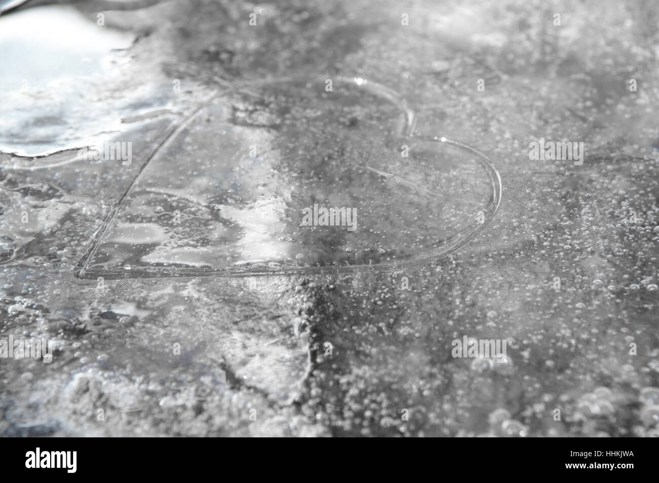 Love heart shape frozen in ice for valentines day Stock Photo - Alamy