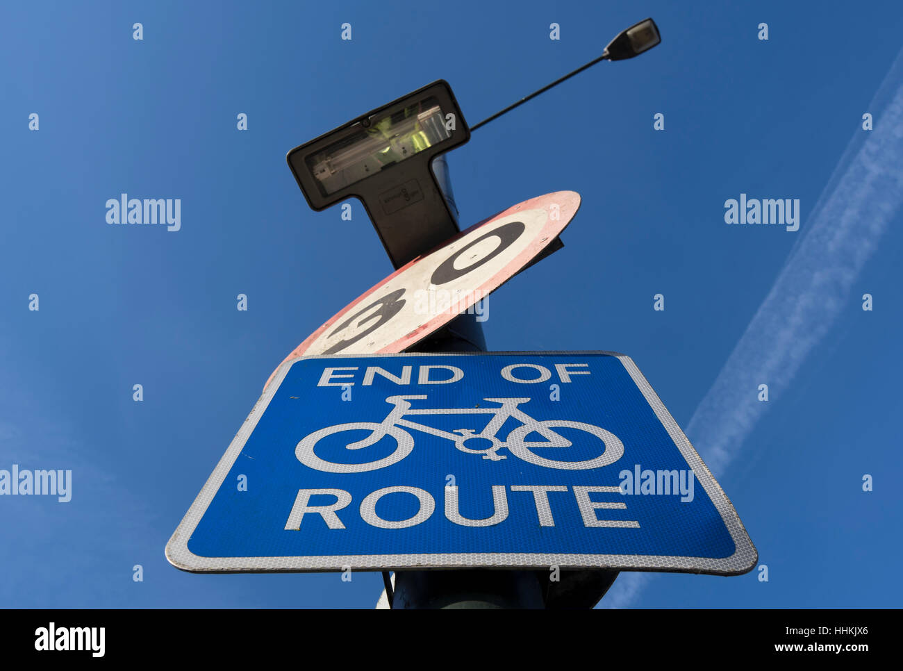 british end of cycle route road sign beneath a 30mph speed limit sign ...