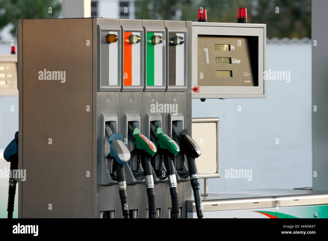 Closeup of four pumps at a petrol station Stock Photo - Alamy