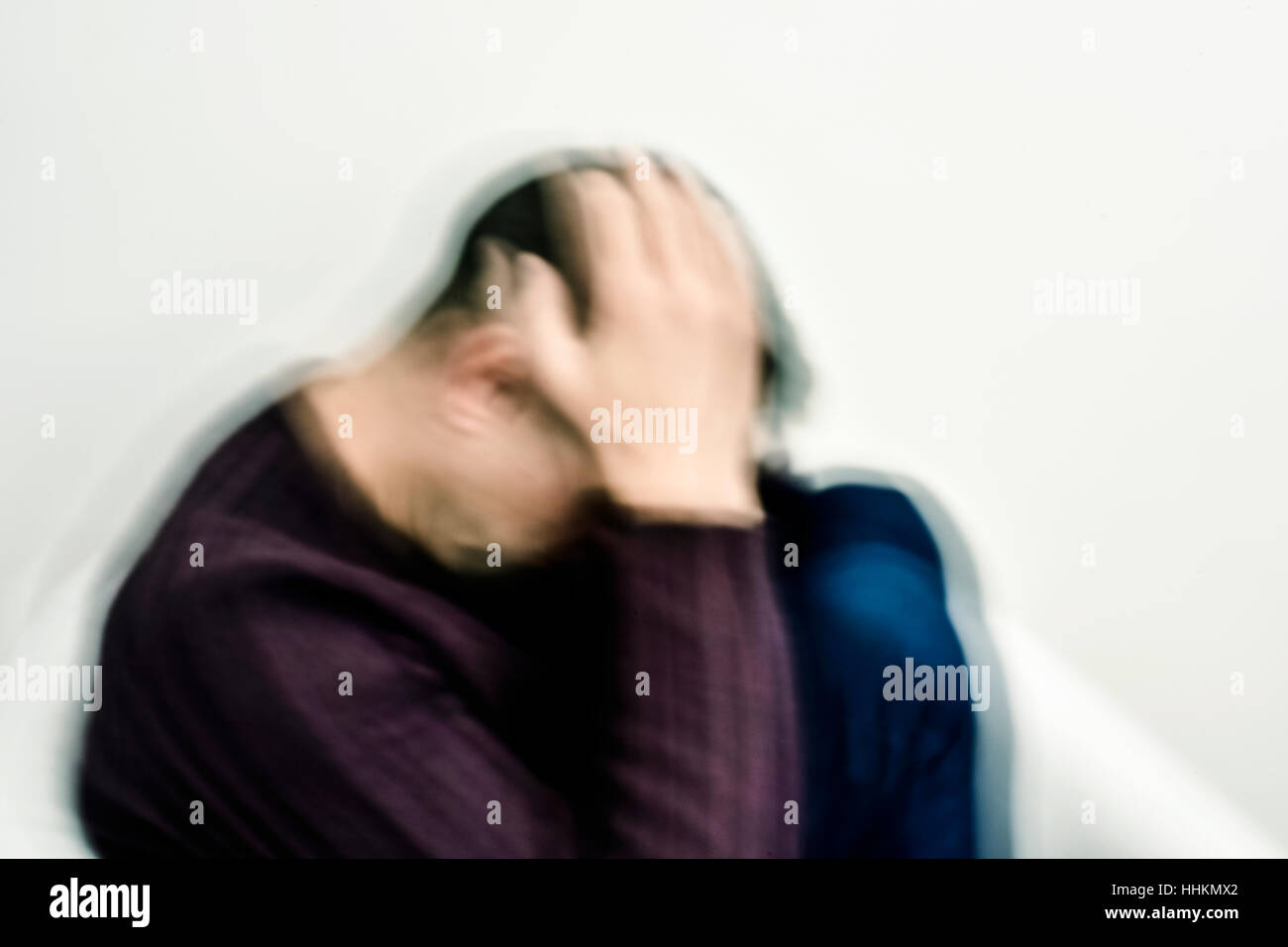 Man curled up hi-res stock photography and images - Alamy