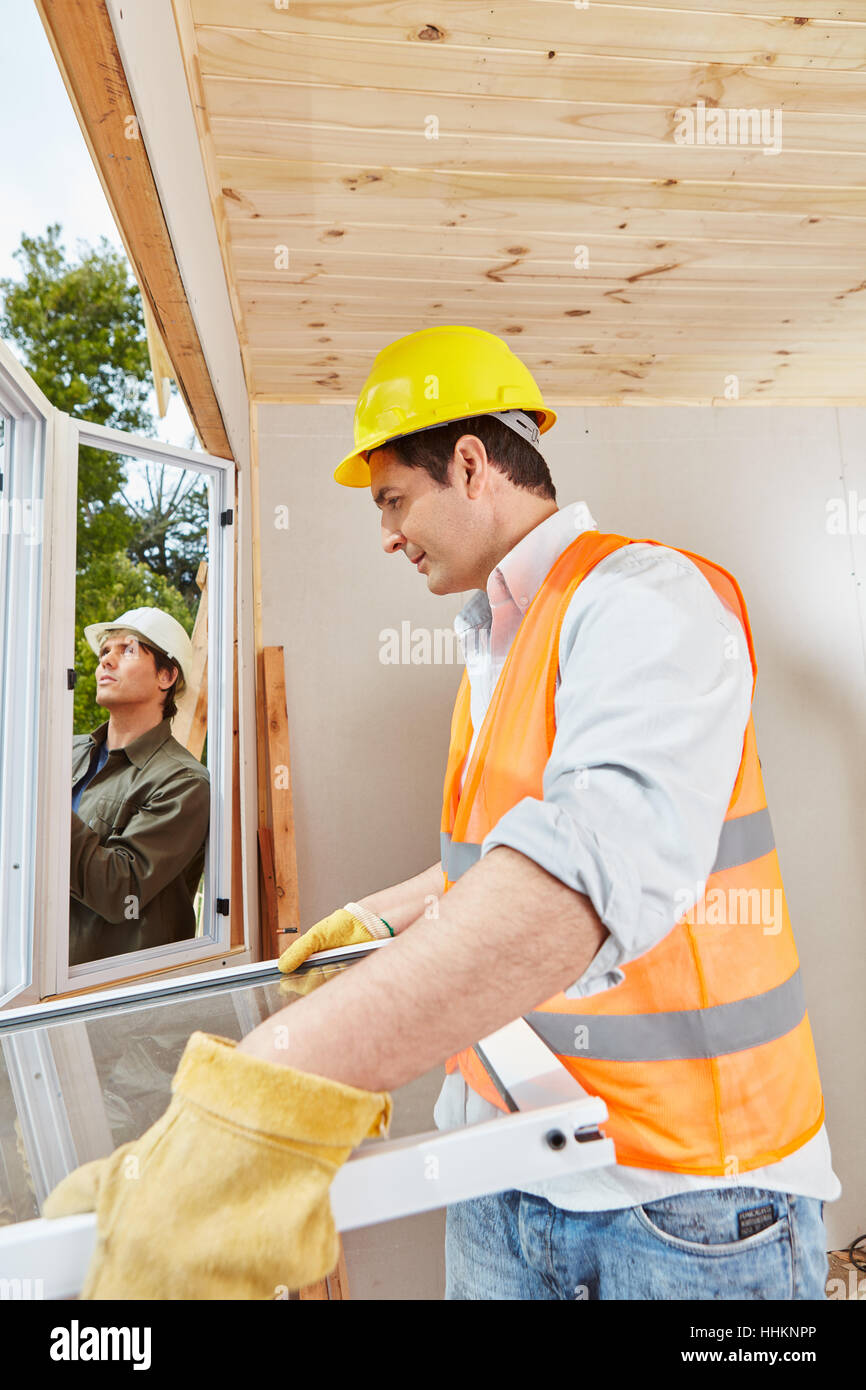 Window fitting installation process for woodhouse modernization Stock ...