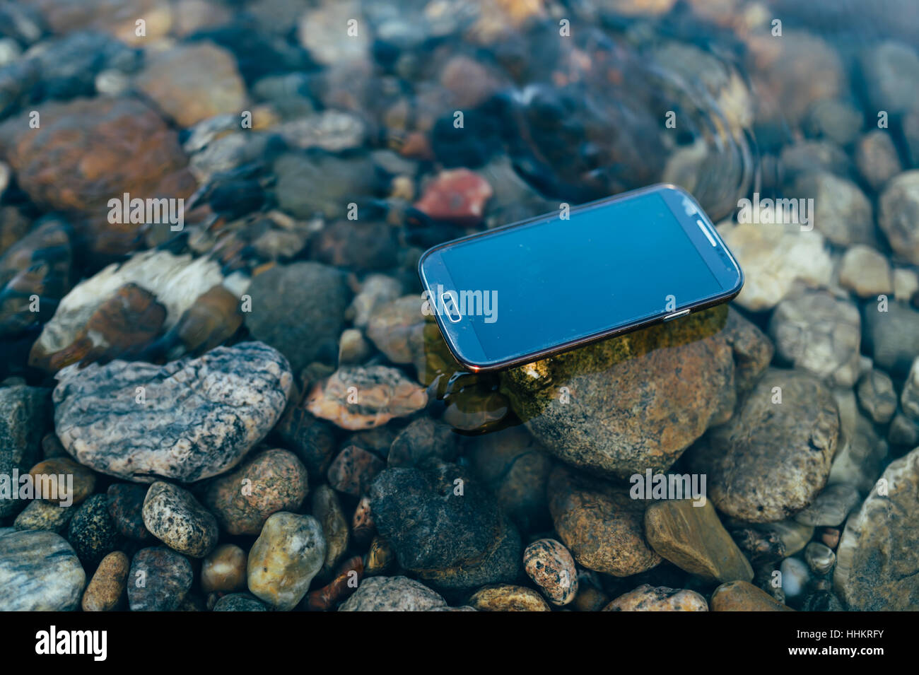 Lost man modern smartphone supported floating on the water Stock Photo ...