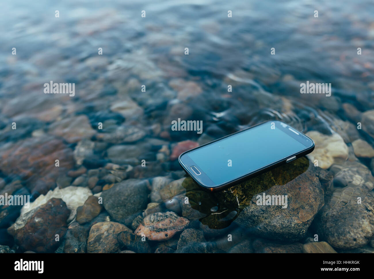 Lost man modern smartphone supported floating on the water Stock Photo ...