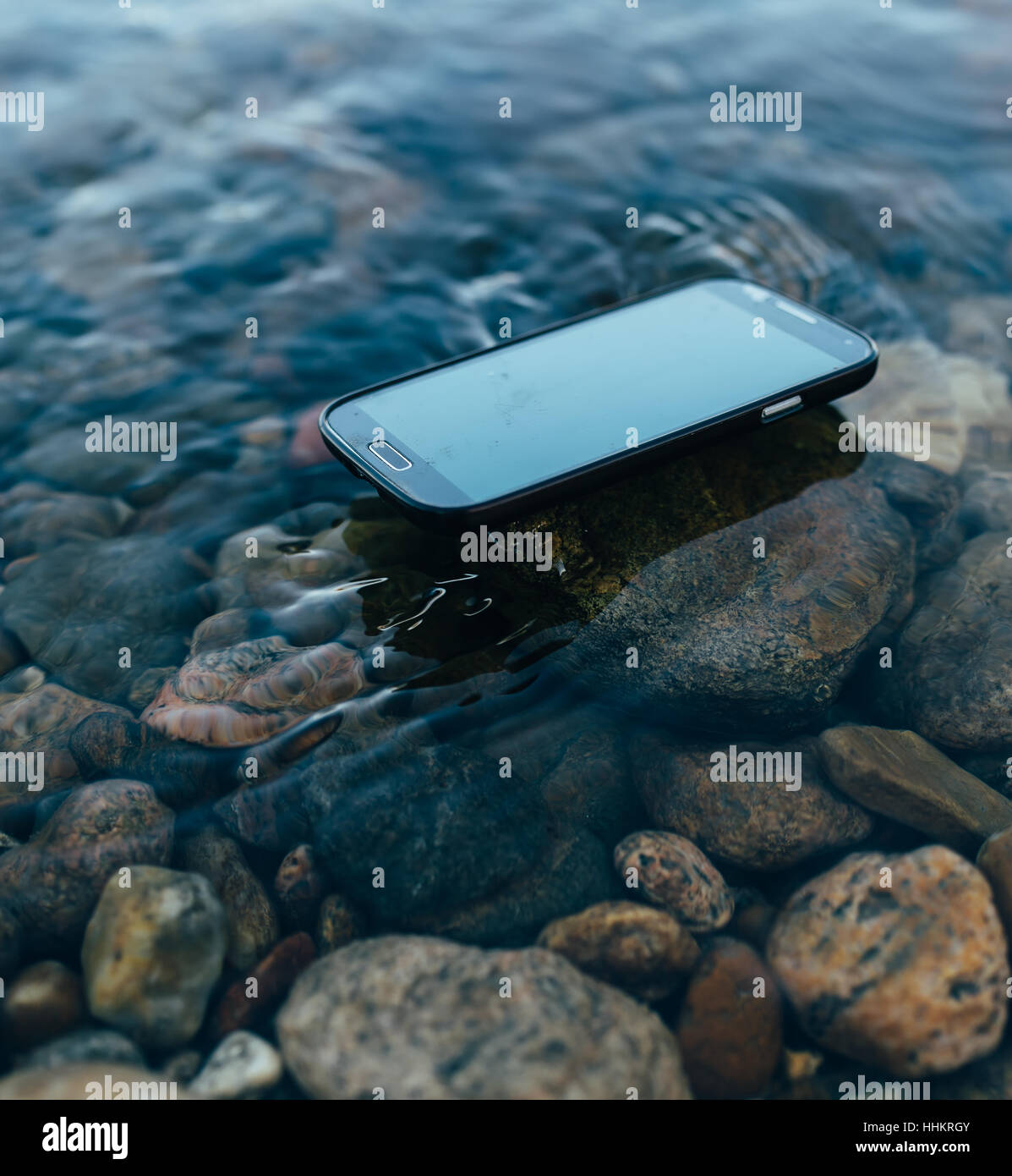 Lost man modern smartphone supported floating on the water Stock Photo ...