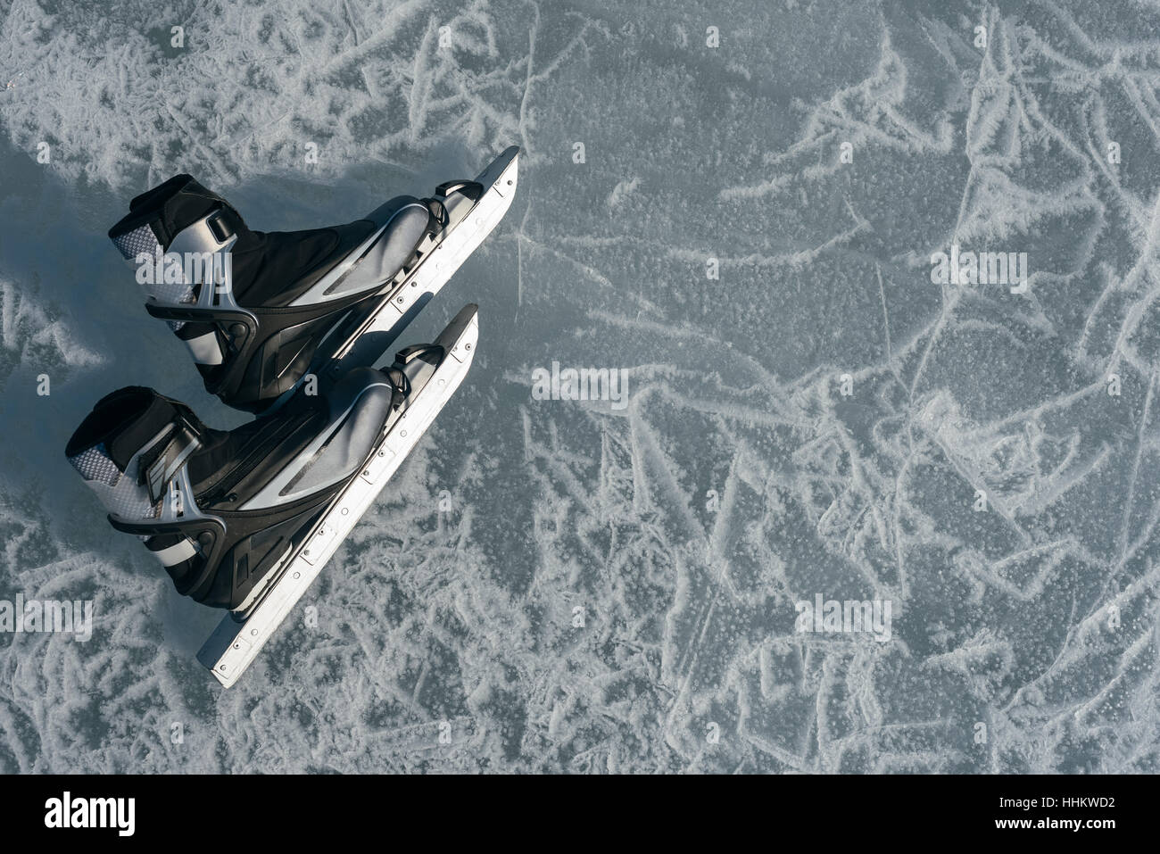 Tourists travel to Norway hiking ice skating on the frozen lake ...