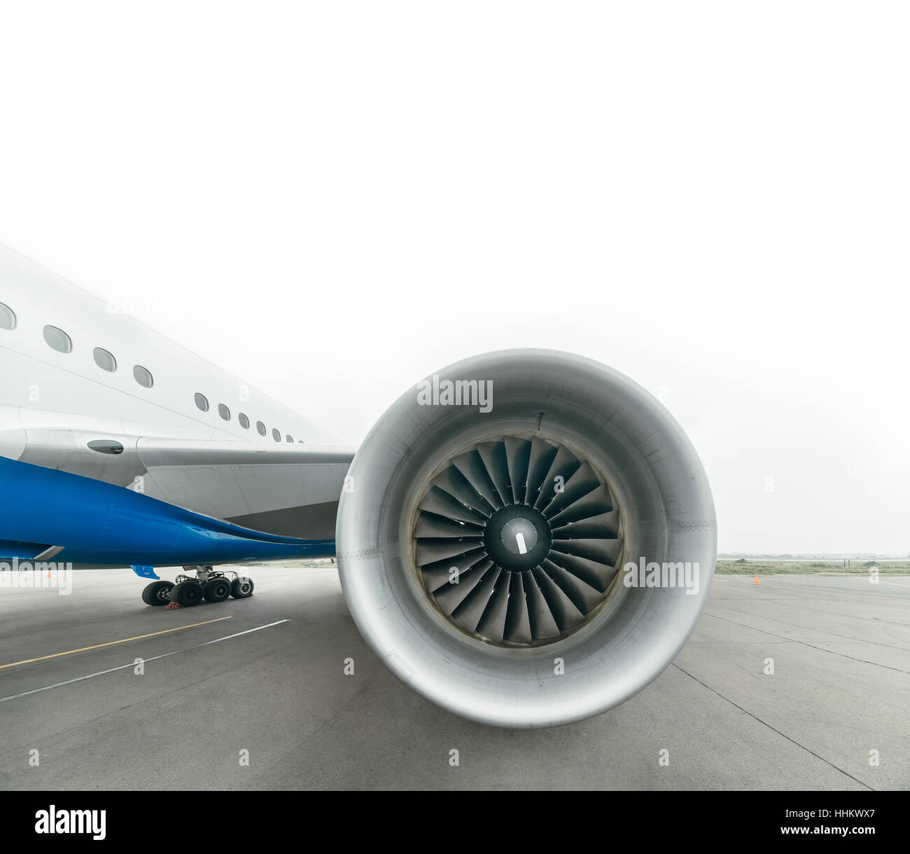 Airplane on the airfield. View of the engine. Top pure white background ...