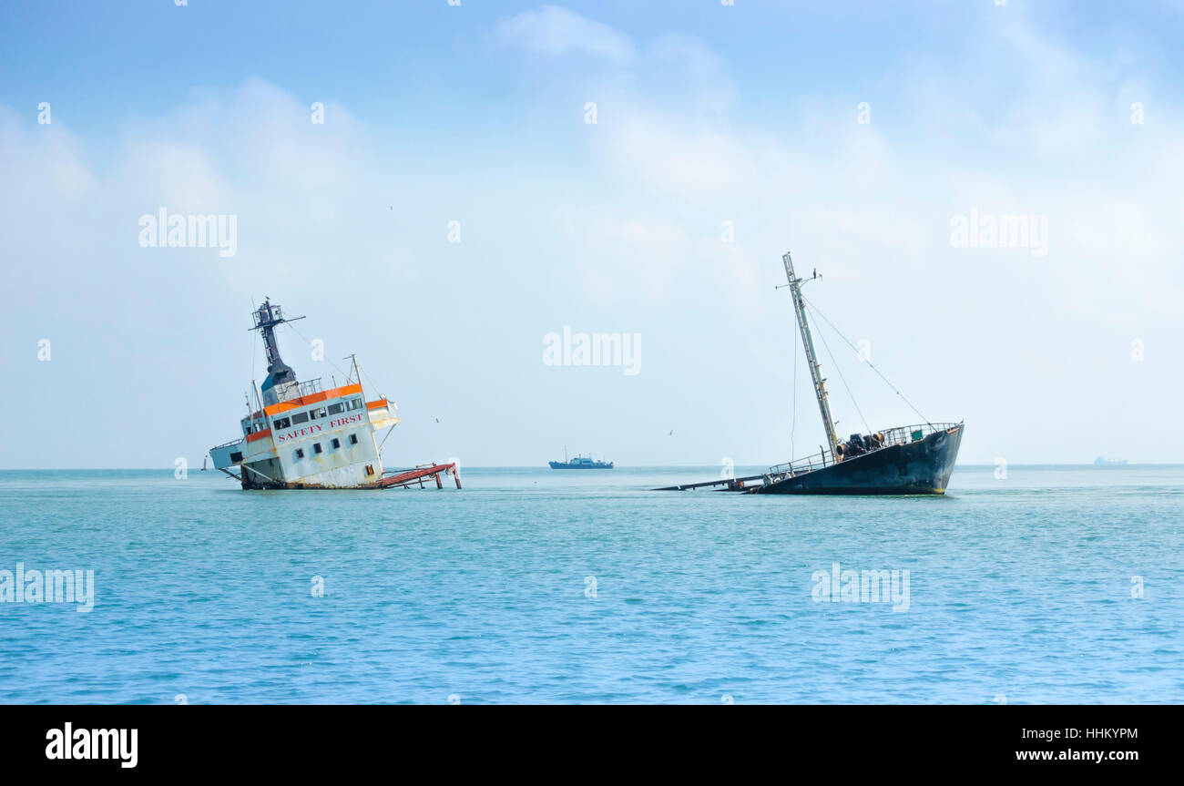 shipwreck, sinking cargo ship in the middle of the sea Stock Photo - Alamy