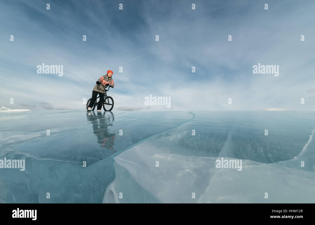 Girl on a bmx on ice Stock Photo - Alamy